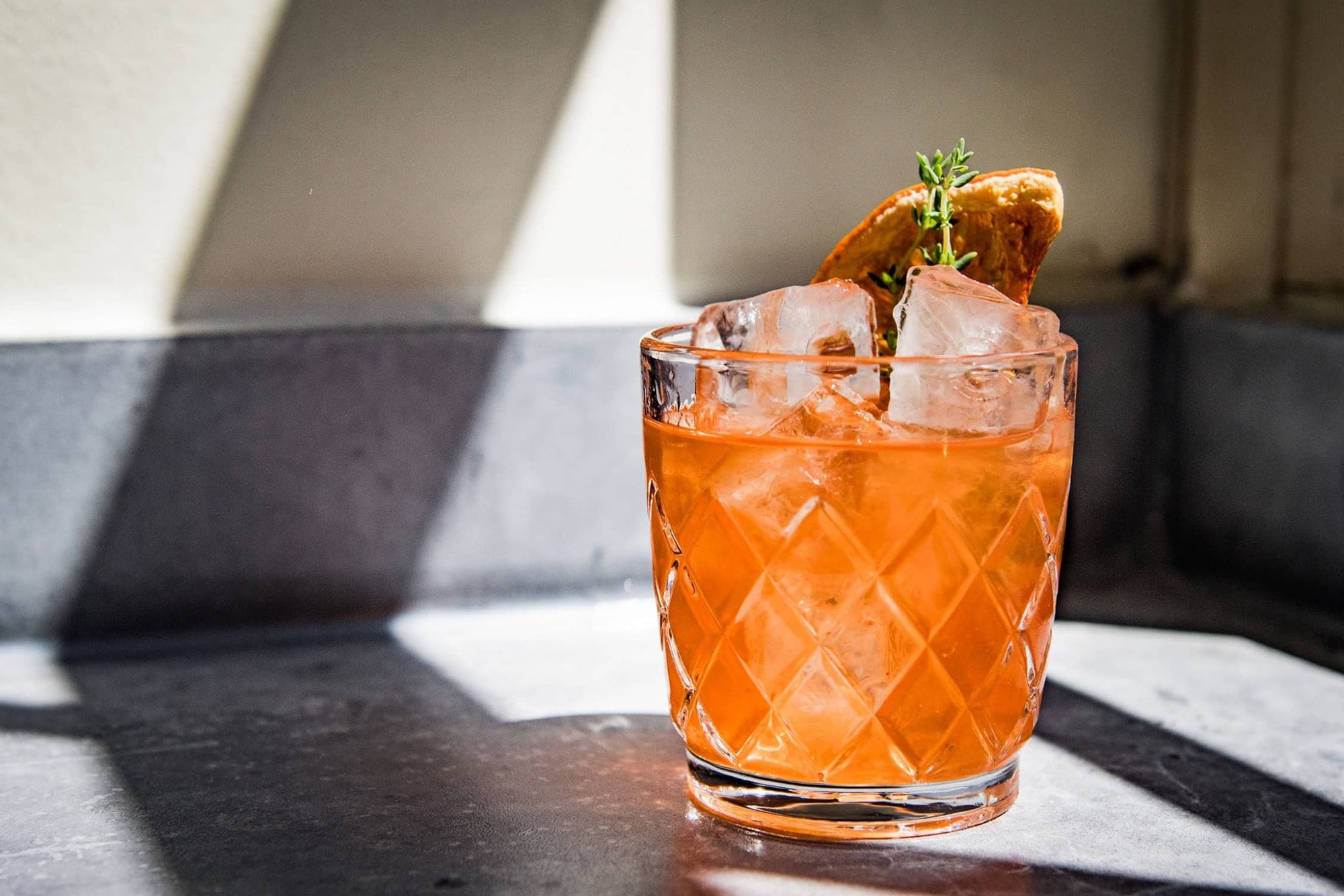 Sour Peach Negroni From Jewel of the South - Imbibe Magazine
